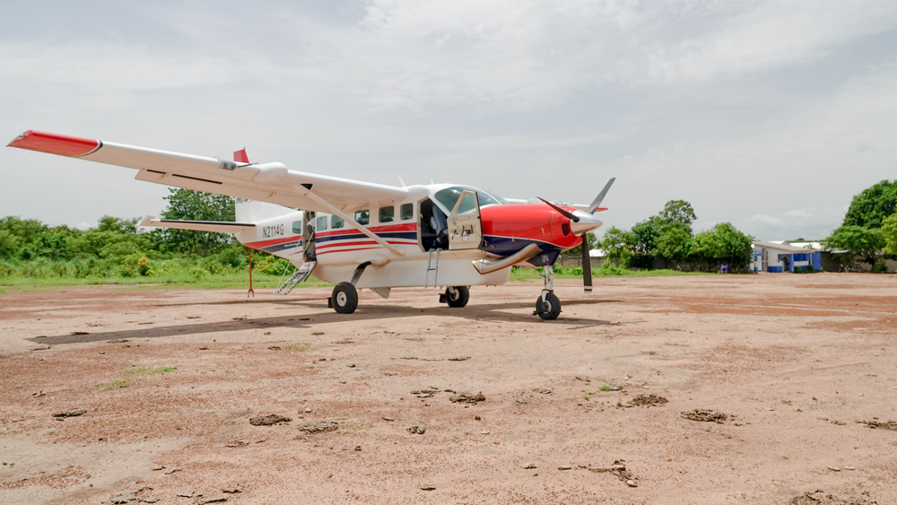 Passengers on a mission with MAF flight to Guinea’s heart | MAF ...